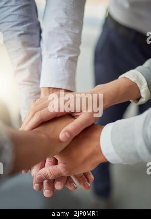 Group of business people joining hands, close-up. Teamwork, cooperation ...