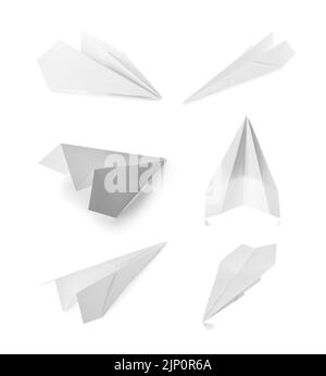 Many white handmade paper planes on yellow background. Space for text ...