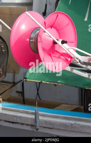 Colourful squid jigging machine Stock Photo - Alamy