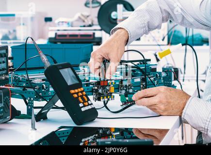 Assembling and adjust the electronics instrument for precision physical ...