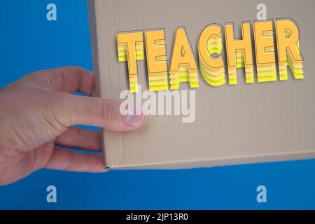 Teacher word with cardboard box. Brown folded cardbox Stock Photo - Alamy
