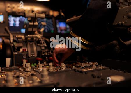 Captain and copilot switching power engine buttons on dashboard and ...