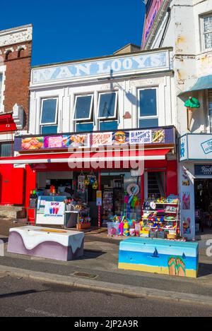 Old shop sign uncovered in Southend on Sea, Essex, UK. Van Looys ...