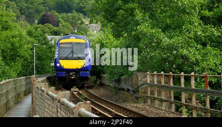 PERTH CITY SCOTLAND A SCOTRAIL TRAIN CROSSING THE RAILWAY BRIDGE OVER ...