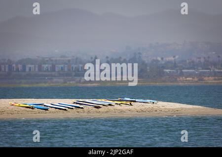 Surfboards lie on a beach at the Silver Strand south of Coronado ...