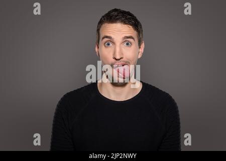 Smiling face with open mouth emoticon Stock Photo - Alamy