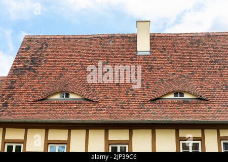 Traditional brick country cottage with dormer windows tile roof and ...