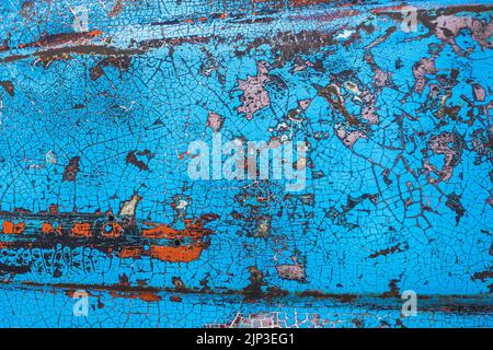 Enamelled colorful cracked and peeling surface of old motorcycle. Rusty ...