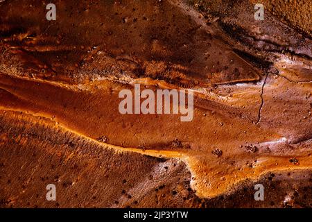 colored mud river, close view Stock Photo - Alamy