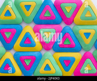 erasers in a triangular shape Stock Photo - Alamy