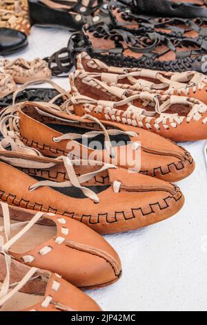 traditional romanian peasant leather shoes Stock Photo - Alamy