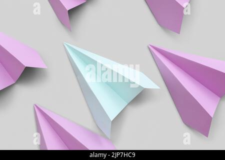 Colorful paper planes on grey background Stock Photo - Alamy