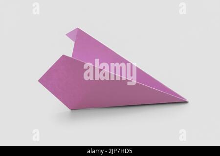 Lilac paper plane on grey background Stock Photo - Alamy