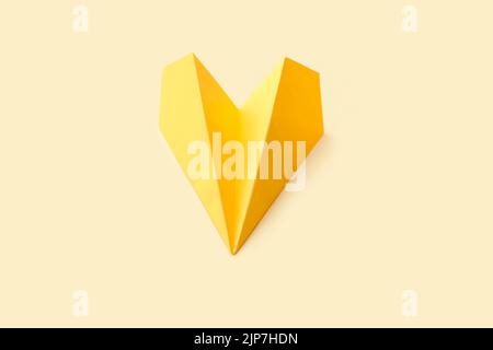 Yellow paper plane on beige background Stock Photo - Alamy