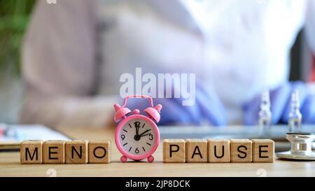 Menopause Time Clock Wooden Block Text Stock Photo - Alamy