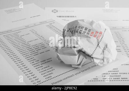 Scrunched up Bank Statement showing account in debt Stock Photo - Alamy