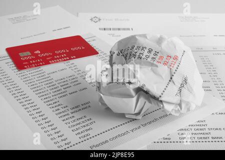 Scrunched up Bank Statement showing account in debt Stock Photo - Alamy