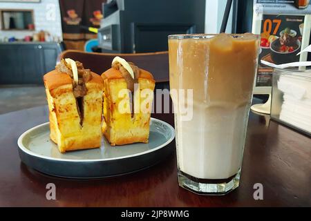 Bread Toast at Malacca Toast Cafe, Jakarta, Indonesia Stock Photo - Alamy