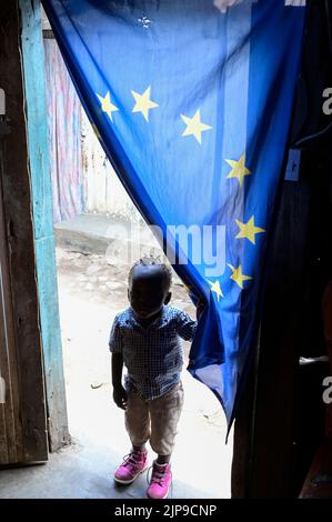 KENYA, Nairobi, Mathare Slum, bar with EU flag at entrance / KENIA ...