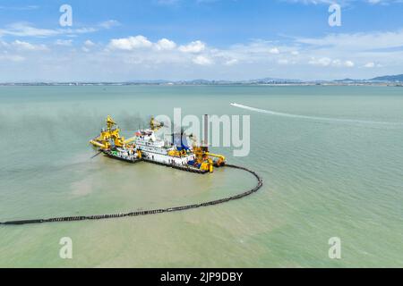 LIANYUNGANG, CHINA - AUGUST 16, 2022 - A large cutter suction dredger ...