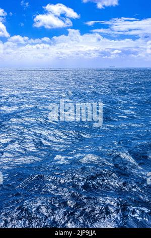 Cloudscape over choppy seas in the North Sea off the coast of Denmark ...