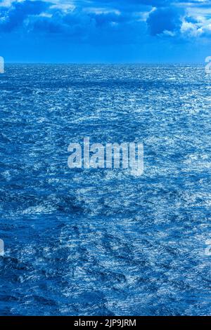 Cloudscape over choppy seas in the North Sea off the coast of Denmark ...