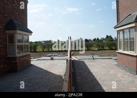 Wall between and windows of newly constructed houses building site ...