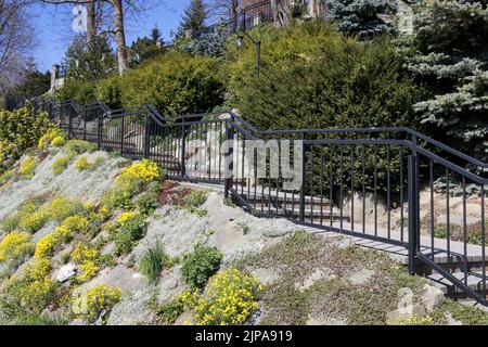 Beautiful rockery garden with viewing platform. Relax place Stock Photo ...