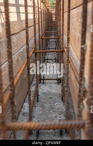 Tied rebar and mounted formwork close-up before pouring the strip ...