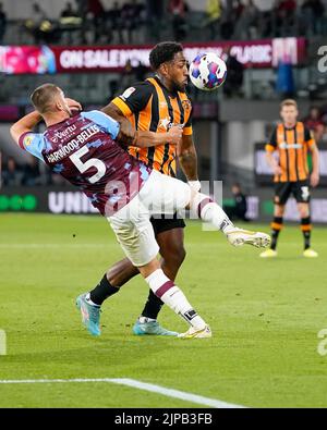 Taylor Harwood-Bellis #5 of Burnley competes for the ball with Mallik ...