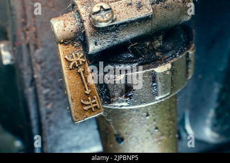 Diesel filter handle with inscriptions in Chinese open and close on the ...