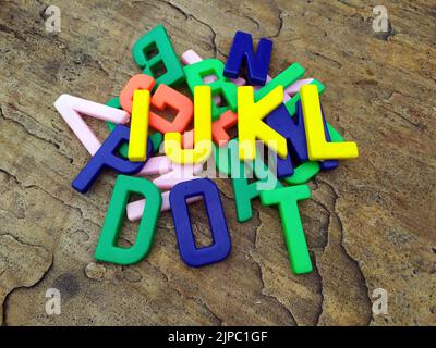 Multi color alphabet letter isolated on stone background Stock Photo ...