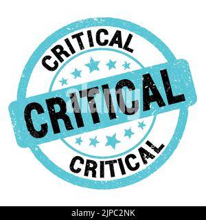 CRITICAL text written on blue-black lines stamp sign Stock Photo - Alamy