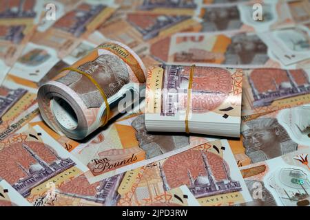 Pile of the new first Egyptian 10 LE EGP ten pounds plastic polymer ...