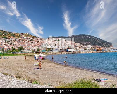 A shot of the Skopelos town with boats in a nice beach in Greece with ...