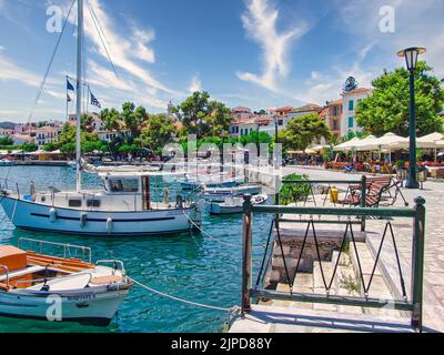 A shot of the Skopelos town with boats in a nice beach in Greece with ...