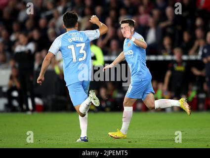 Sunderland's Luke O'Nien (right) celebrates at the final whistle after ...