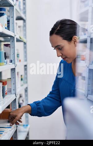 So much to choose from. An attractive young woman holding a bunch of ...