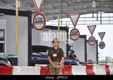 A border guard at the reconstructed checkpoint on the Ukrainian-Polish ...