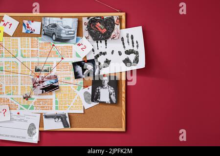 Crime board hanging on color wall in FBI agent's office Stock Photo - Alamy