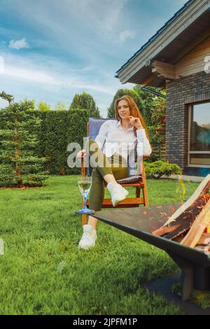 Woman enjoy nature at country house Stock Photo - Alamy