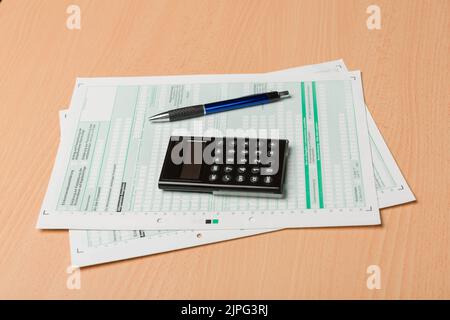 close-up of forms and tools for filing a tax declaration Stock Photo ...