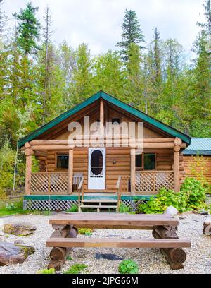 Red wooden chalet and yellow Autumn leaves, Urke, Møre og Romsdal ...