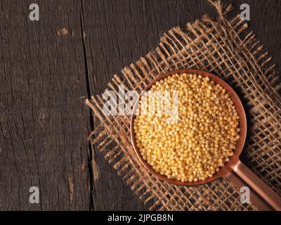 Millets seeds top view, directly above. Heap of dry millet. Hulled ...