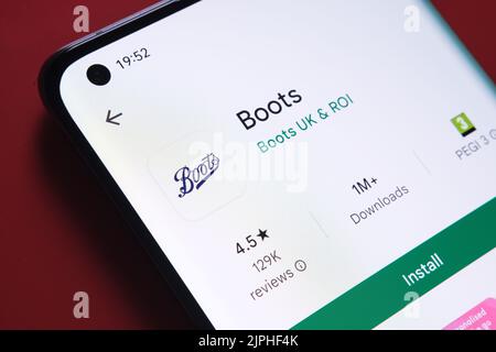 Boots app on smartphone screen with a Mastercard to pay for the ...