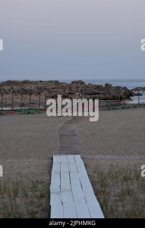 Pathway at beautiful sandy Manganari beach on Ios Island. Cyclades ...