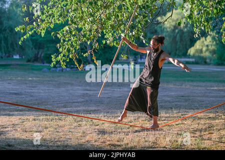 Slackline walker, John Hendry Park, Vancouver, British Columbia, Canada ...