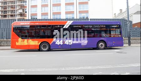Cardiff single decker electric bus at a bus stop on Westgate Street ...