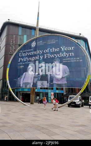 Cardiff Central Library with very large university banner. August 2022 ...
