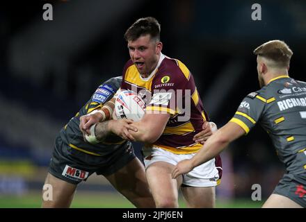Castleford Tigers’ Alex Mellor is tackled by Wigan Warriors’ Sam ...